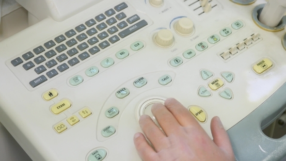 Doctor Works At Keyboard Of Ultrasound Device, Stock Footage | VideoHive