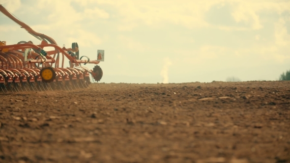 Tractor Plowing Field At Sunset, Stock Footage | VideoHive