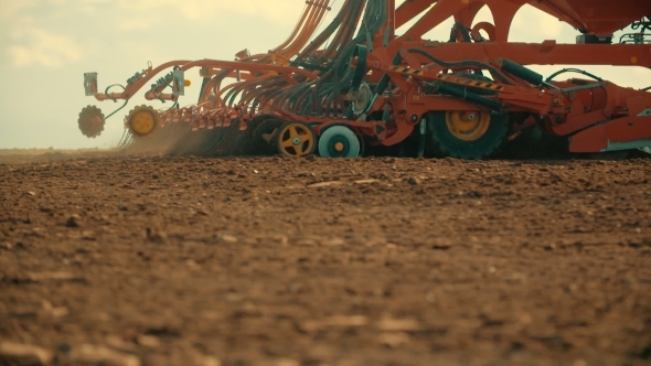 Tractor Plowing Field At Sunset, Stock Footage | VideoHive