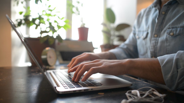 Designer Typing an Email, Laptop, Stock Footage | VideoHive