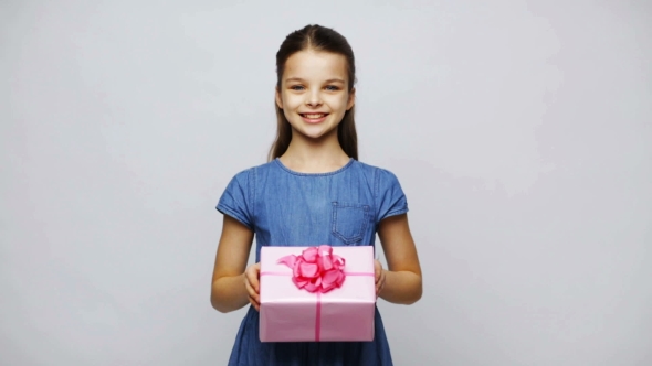 Happy Smiling Girl Holding Gift Box, Stock Footage | VideoHive