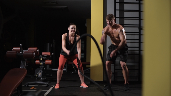Bodybuilder Teaches Exercise His Girlfriend, Stock Footage | VideoHive
