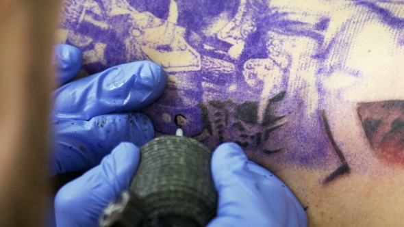 Tattooing On The Body. Tattoo Artist Make Tattoo In Studio, Stock Footage