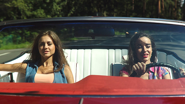 Two Happy Friends In The Red Car, Stock Footage | VideoHive
