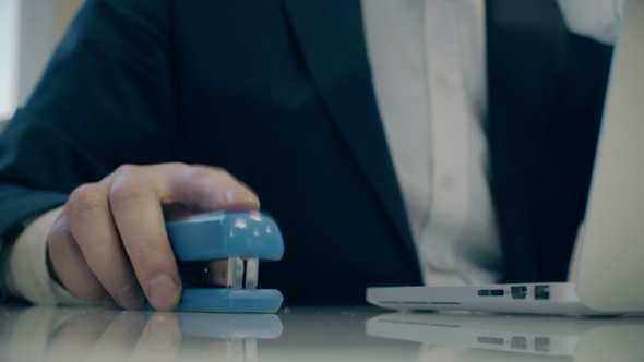 Businessman Uses Stapler Like a Mouse. Office Fun, Stock Footage ...