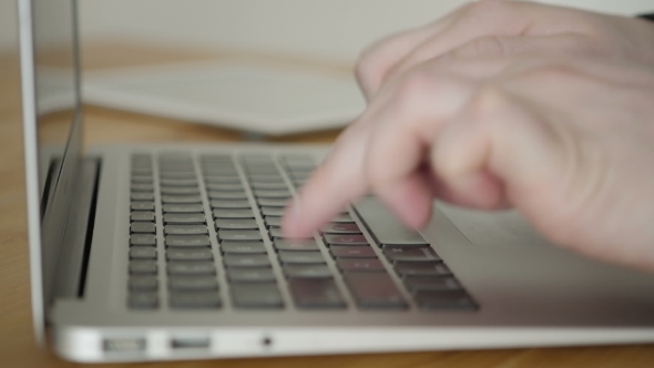 Businessman Press a Key On a Laptop Keyboard, Stock Footage | VideoHive