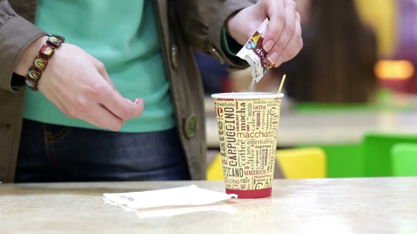Shot Of Woman Put Brown Sugar Into Cup With Tea Or Coffee, Stock Footage
