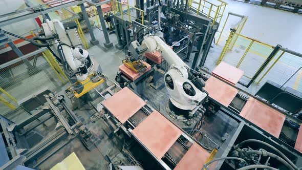 Cybernetic Machines are Transporting Copper Plates, Stock Footage ...