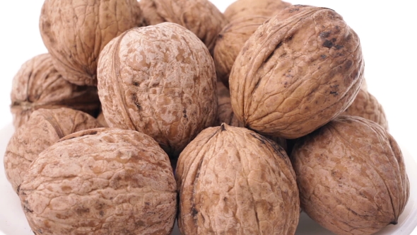 Walnuts Rotation On a White Background, Stock Footage | VideoHive