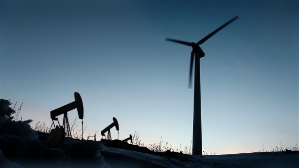 Windmill And Oil Rig At Sunset., Stock Footage | VideoHive