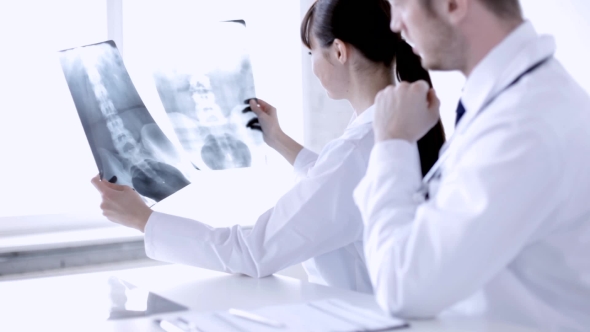 Two Doctors With X-ray Scans At Hospital 25, Stock Footage | VideoHive