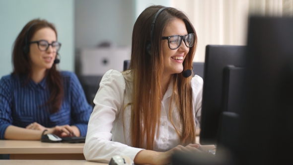 Two Beautiful Girls Communicate With Customers In a Call Center, Stock ...