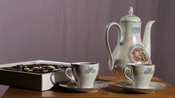 Tea Set On The Table With Chocolate Candy, Stock Footage | VideoHive