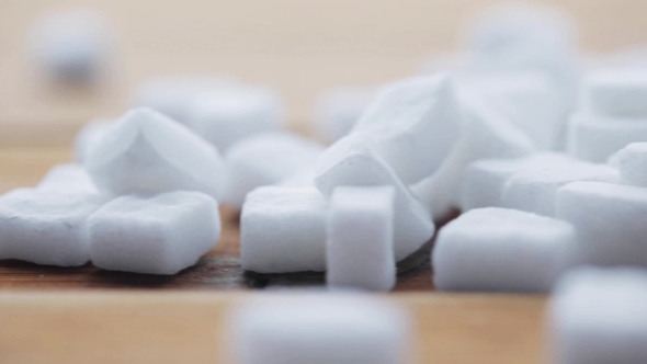 White Lump Sugar Pouring On Wooden Board Or Table 31, Stock Footage