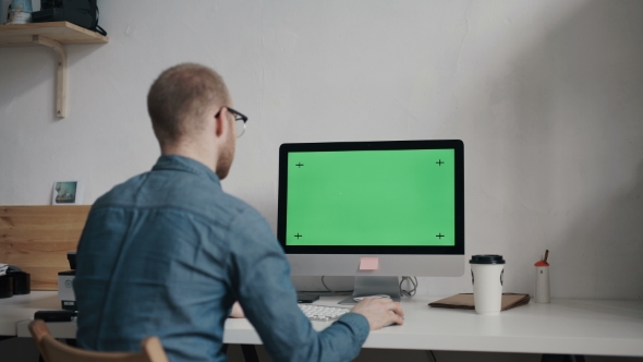 Caucasian Worker Typing On Keyboard And Looking At Green Screen, Stock ...