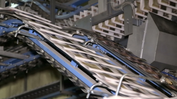 Newspapers Move Along An Assembly Line In a Factory, Stock Footage