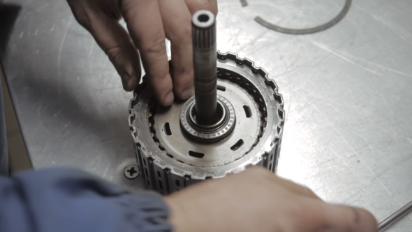 Engineer Hands Fixing Engine Power Transmission Gears Box, Stock Footage