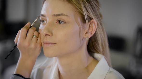 Young Woman Applying Makeup To Model In Salon, Stock Footage | VideoHive