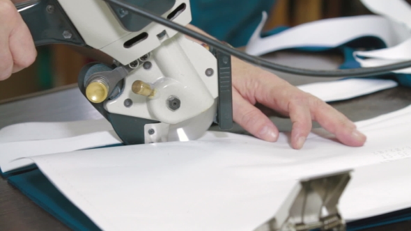 Tailor Cutting The Patterns With Electric Saw, Stock Footage | VideoHive