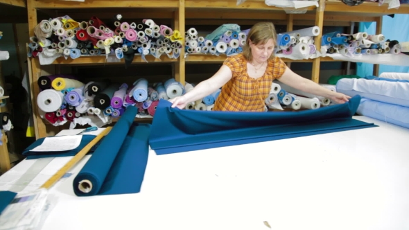 Tailor Folding Textile In Sewing Factory, Stock Footage | VideoHive