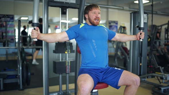 Athletic Man Doing Exercises In a Gym, Stock Footage | VideoHive