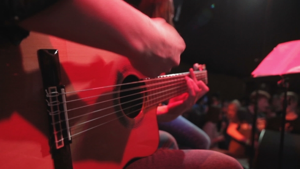 Rock Concert. Rock Musician Playing Acoustic Guitar 01, Stock Footage