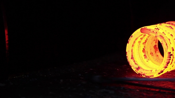 Hot Steel Spring Falls Down To The Oil, Stock Footage | VideoHive