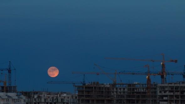 Moon In The Sky Over a Building Site, Stock Footage | VideoHive