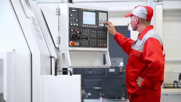 Operator Controls The CNC Machine, Stock Footage | VideoHive