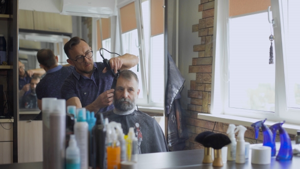 Stylish Barber Works With The Haircut, Stock Footage | VideoHive