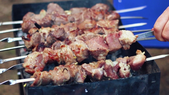 Man Grilling Meat On Mangal. Preparing Food On Grill. Barbecue Meat ...