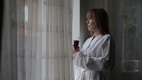 Beautiful Woman Looking Out The Window., Stock Footage | VideoHive