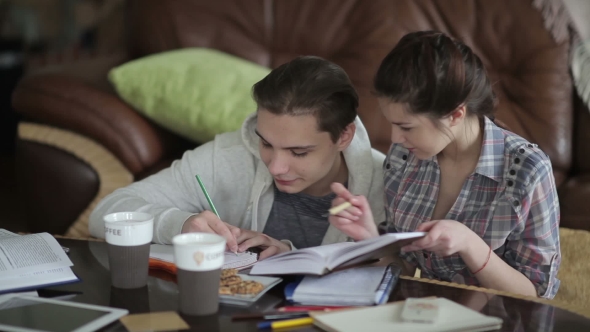 Male Student Is Writing The Task., Stock Footage | VideoHive