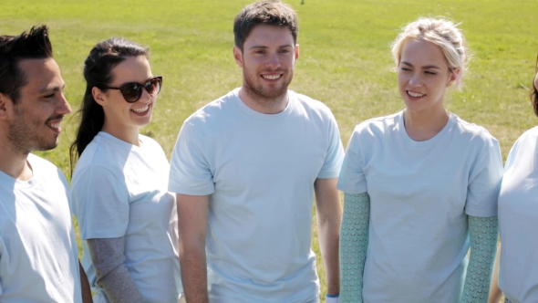 Group Of Volunteers Making High Five In Park 13, Stock Footage | VideoHive