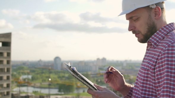 Engineer Looking On Project On Construction Site, Stock Footage | VideoHive