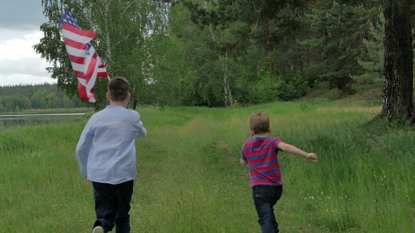 Back View Children Running With The US Flag, Stock Footage | VideoHive