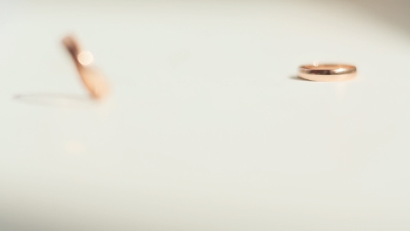 Wedding Rings Rotate On a White Background, Stock Footage | VideoHive
