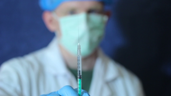Doctor Check The Syringe For Injection 2, Stock Footage | VideoHive