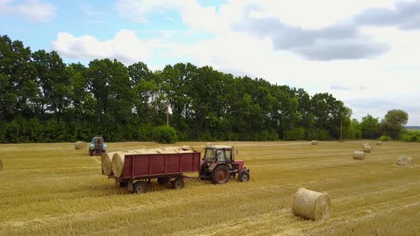Tractor Loading Hay Bales, Stock Footage | VideoHive