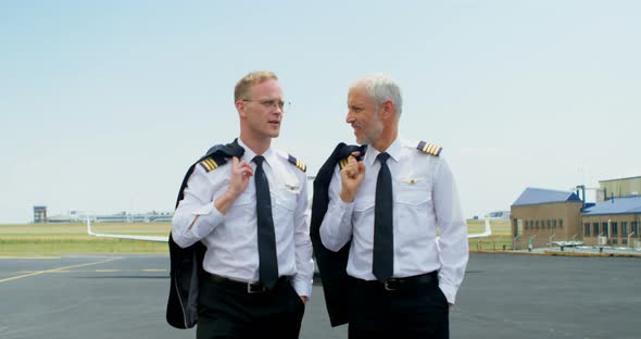 Two Male Pilots Interacting with Each Other 4k, Stock Footage | VideoHive