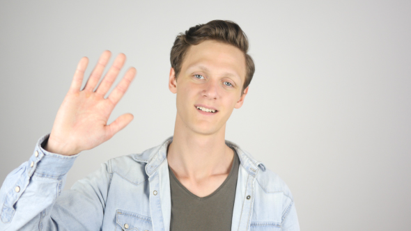 Saying Hello, Gesture by Young Man, Stock Footage | VideoHive