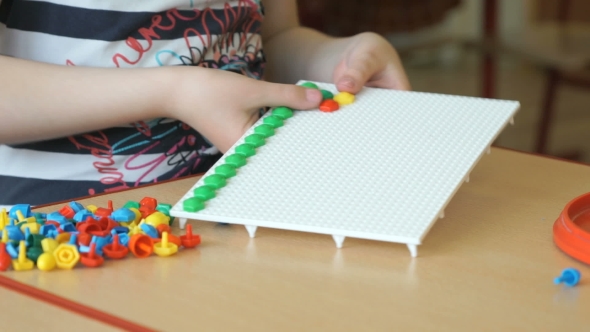 Little Child Plays a Intellectual Game At a Table, Stock Footage ...