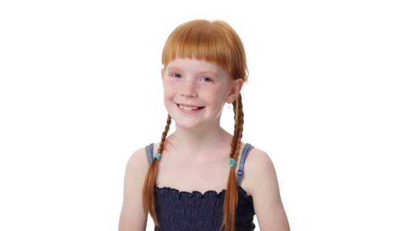 Little Ginger Girl Is Coquettishly Smiling, Stock Footage | VideoHive
