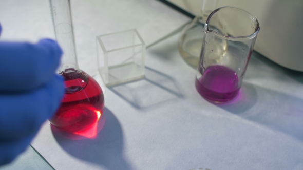 Chemist Places Container With Liquid For Test, Stock Footage | VideoHive