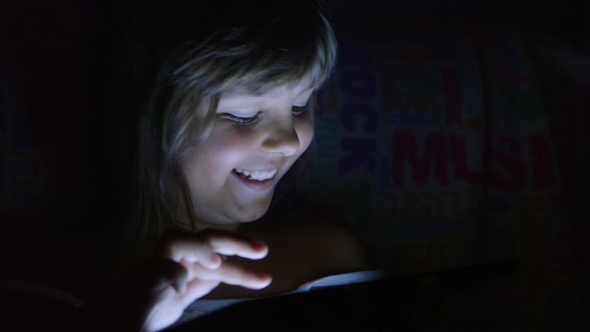 Portrait Of Kid Using a Computer In The Night., Stock Footage | VideoHive