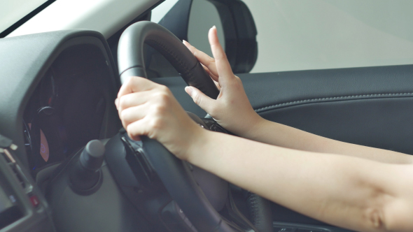 Women Tapping Fingers With Music In Car, Stock Footage | VideoHive