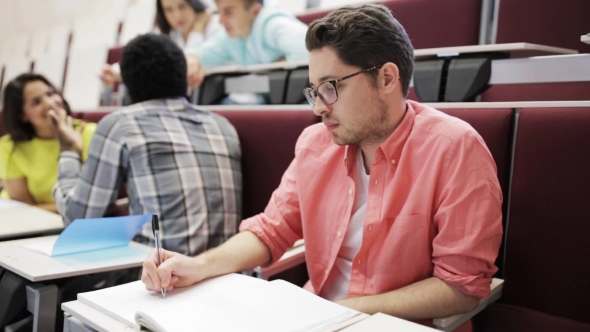 Students And Man Writing To Notebook On Lecture, Stock Footage | VideoHive