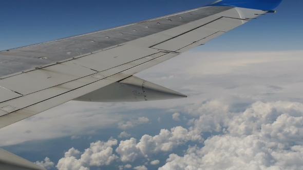 Clouds Under The Wing Of The Aircraft., Stock Footage | VideoHive