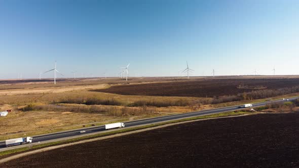 Highway on the Background of Wind Turbines and Blue Sky, Stock Footage