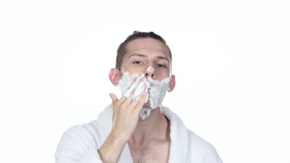 Morning's Procedure. Man Gets Shaving Aid On Face. White Background ...